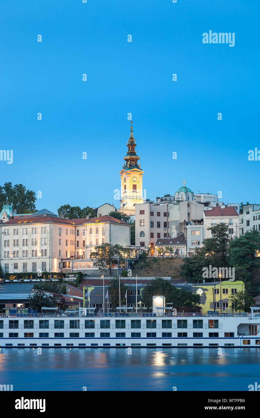 Blue hour view of Belgrade riverfront with Sava river in the foreground ...