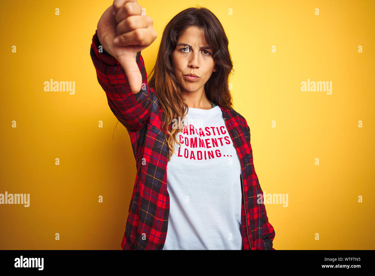 Beautiful woman wearing funny t-shirt with irony comments over isolated ...