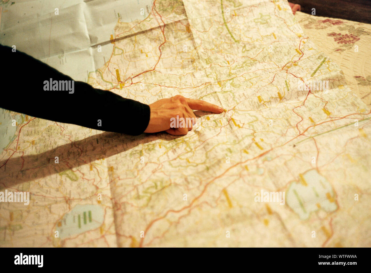 Pointing finger map hi-res stock photography and images - Alamy