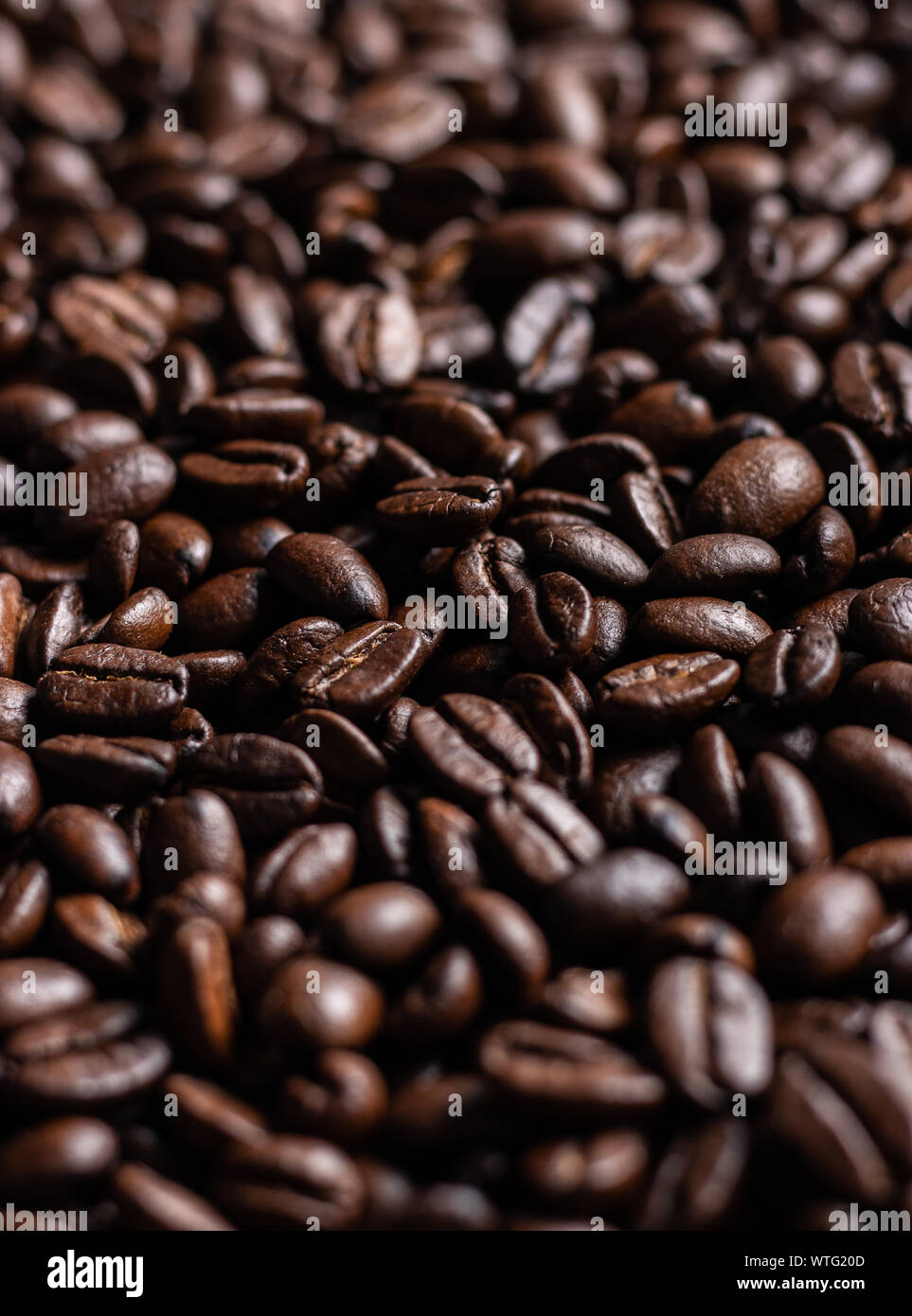 Coffee beans freshly roasted Stock Photo - Alamy