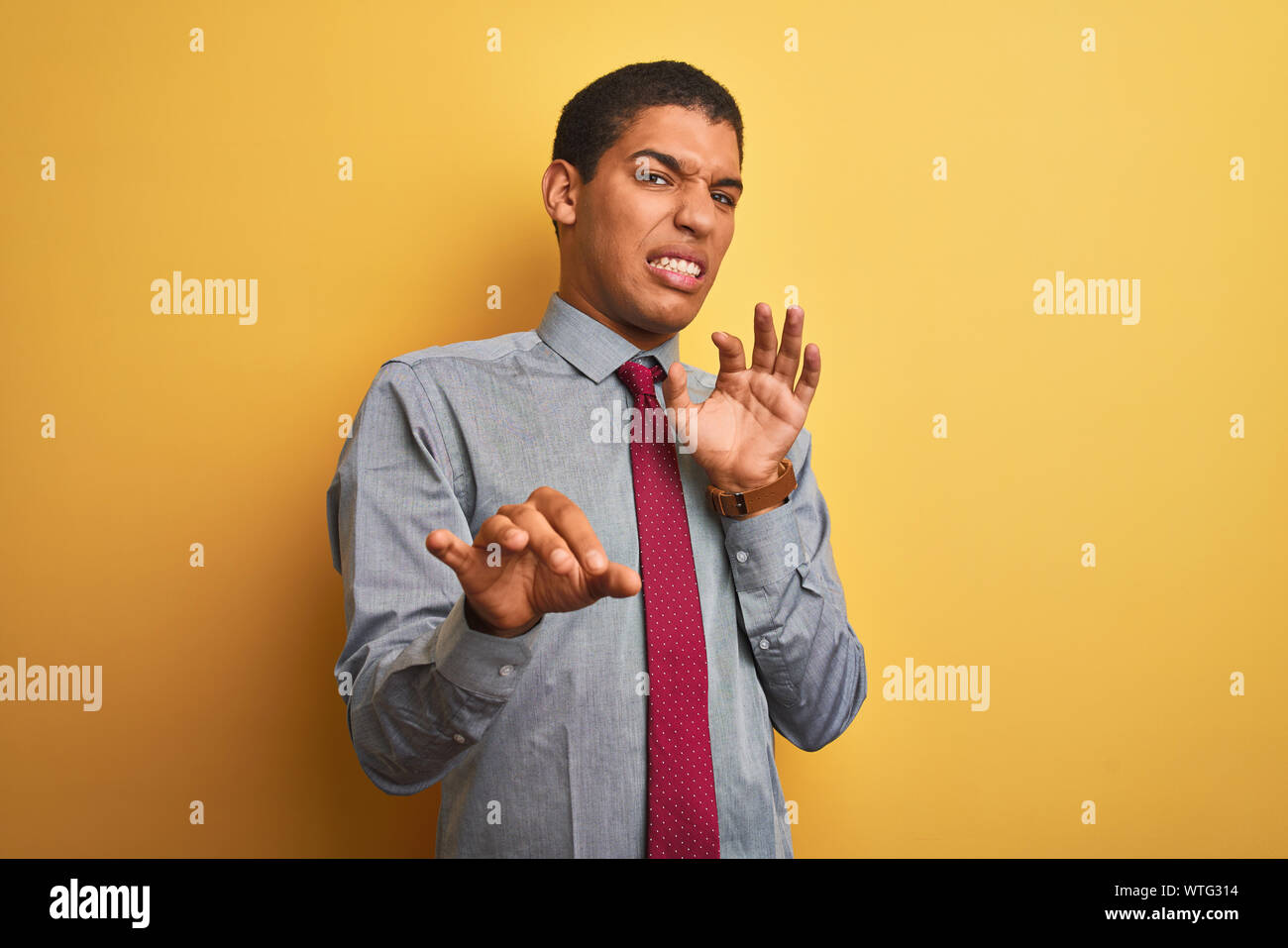Young handsome arab businessman wearing shirt and tie over isolated ...