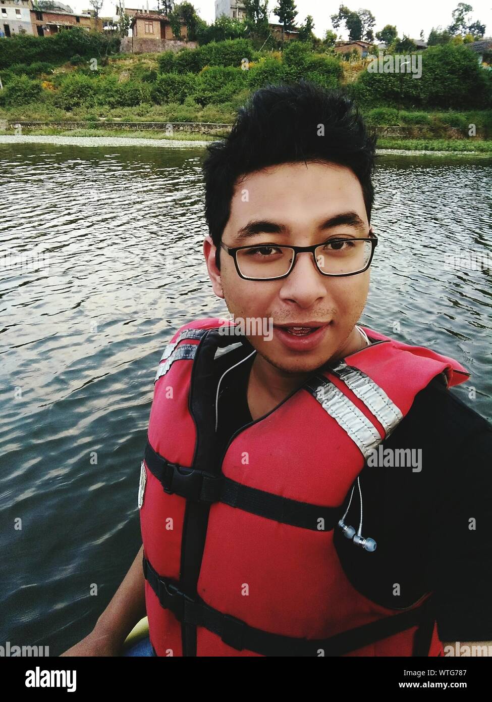 Man with life jacket hi-res stock photography and images - Alamy