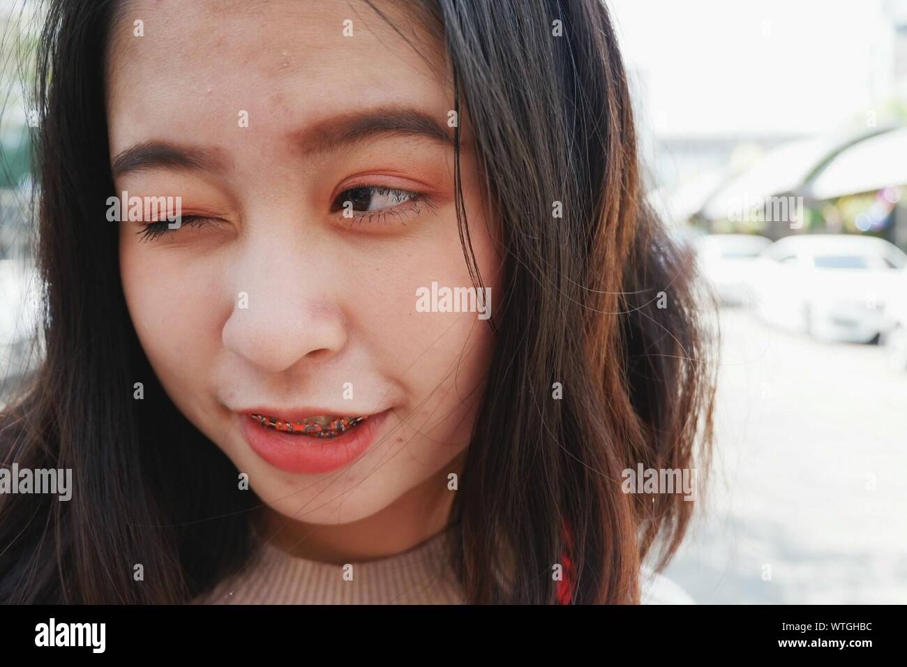 Woman Winking And Smiling High Resolution Stock Photography and Images ...