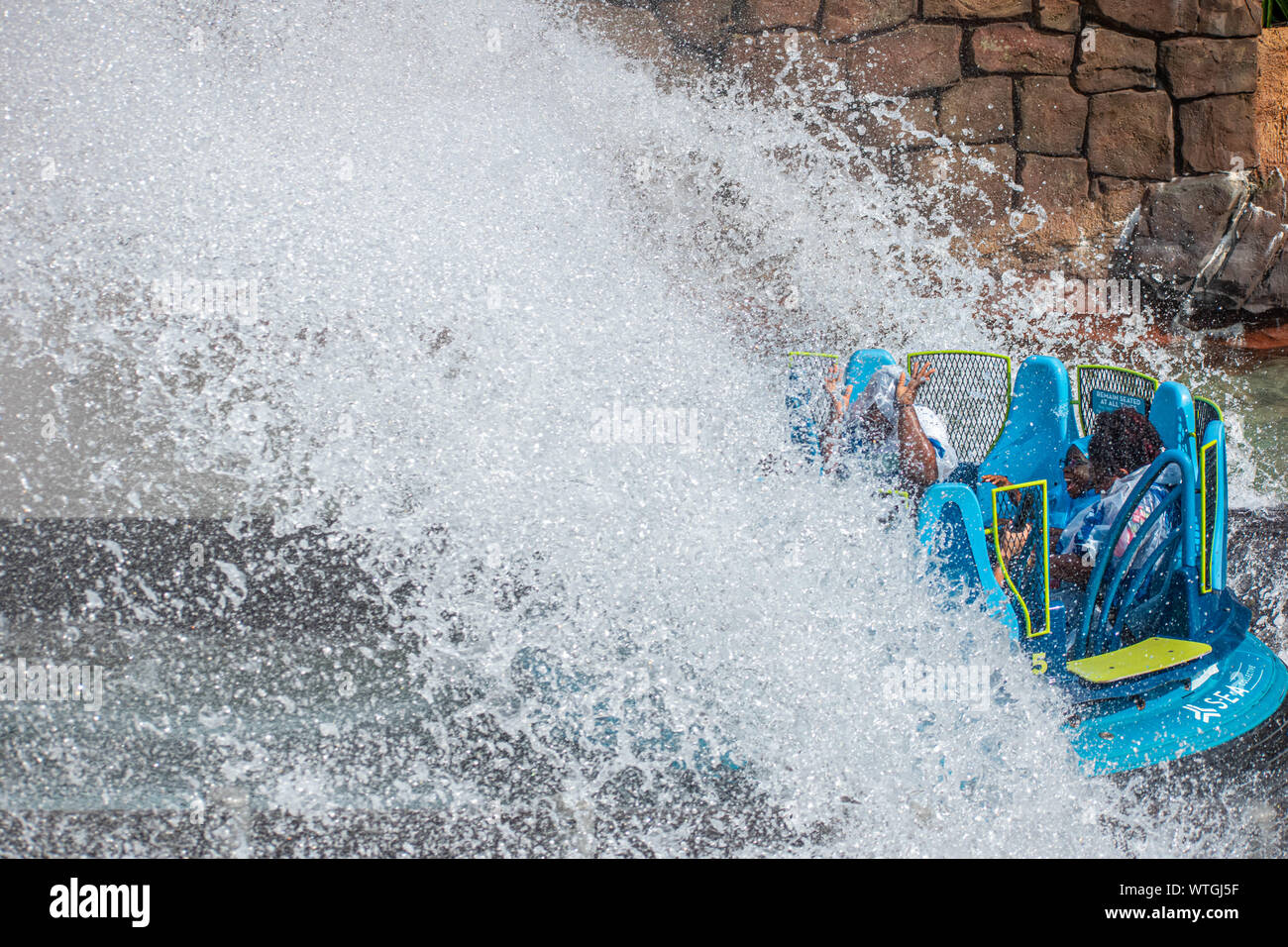 Orlando, Florida. August 28, 2019. People having fun with a big splash ...