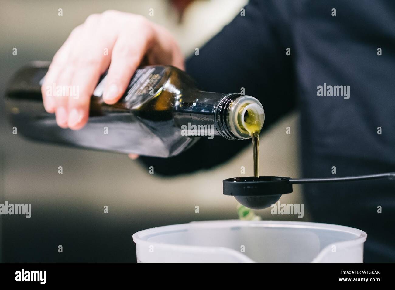 Oil Pouring Bottle High Resolution Stock Photography and Images - Alamy