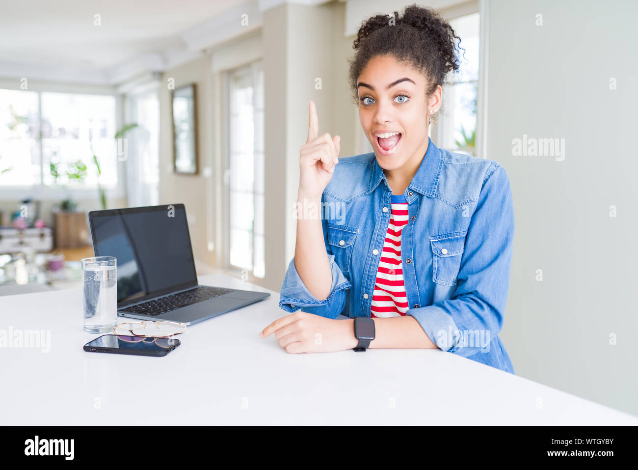 Young african american business woman working using computer laptop ...