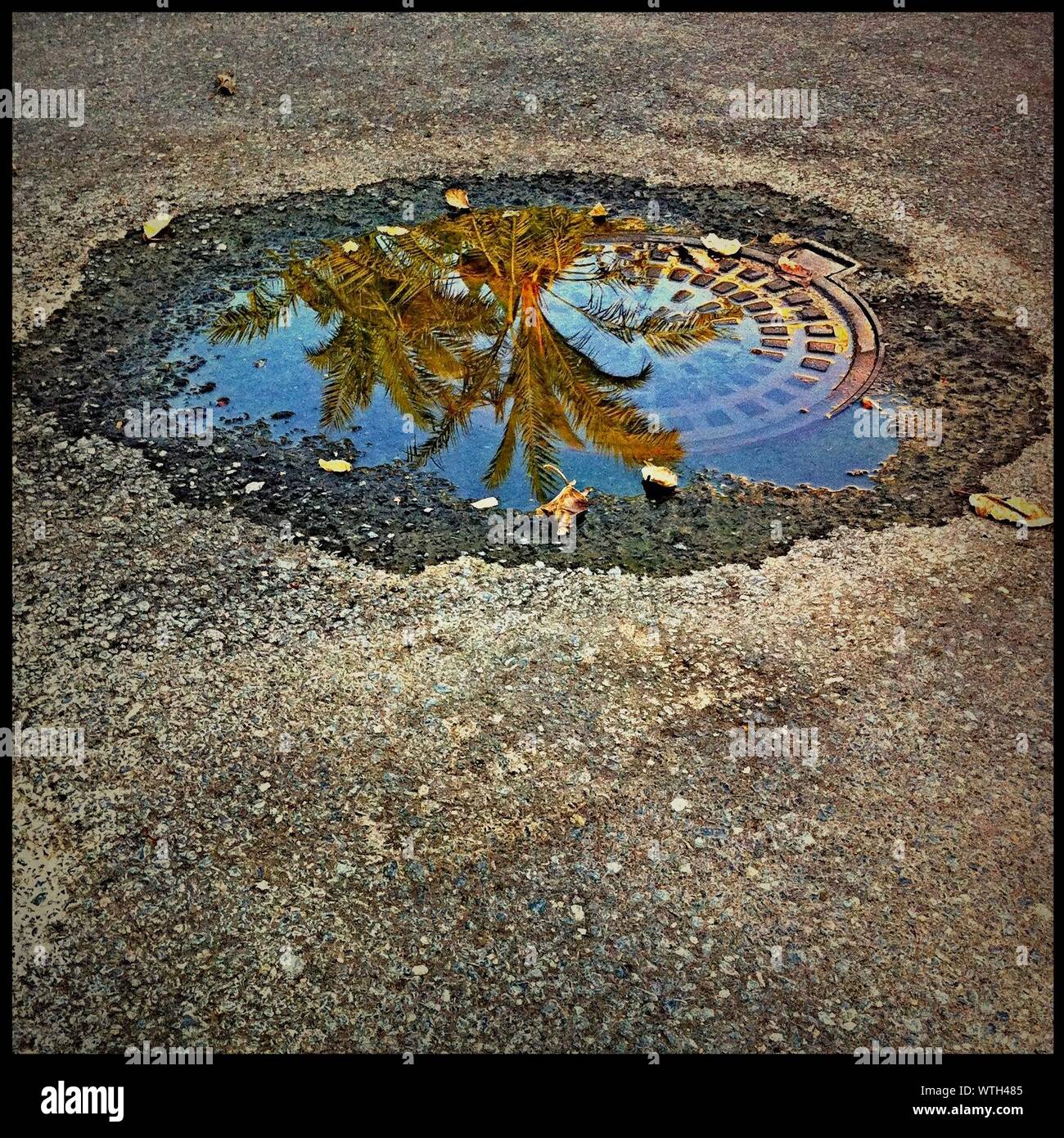 Manhole in view hi-res stock photography and images - Alamy