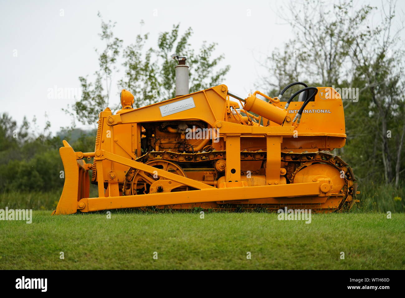 Old bulldozer on the side of the road out at Eden Wisconsin Stock Photo ...