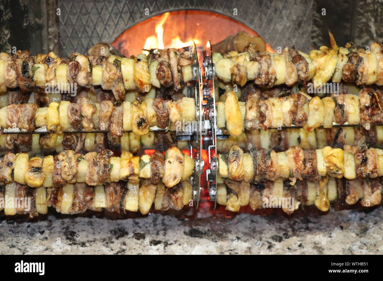 Rotisserie beef on spit fire hi-res stock photography and images - Alamy