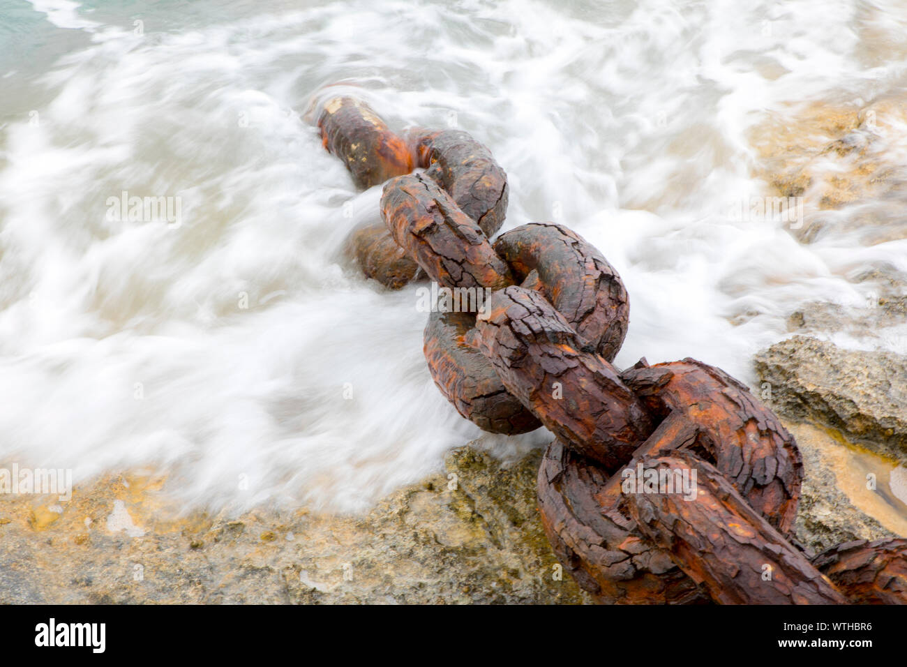 Heavy, heavily rusted iron chains Stock Photo - Alamy