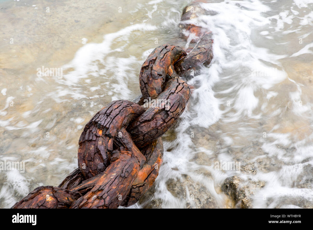 Heavy, heavily rusted iron chains Stock Photo - Alamy