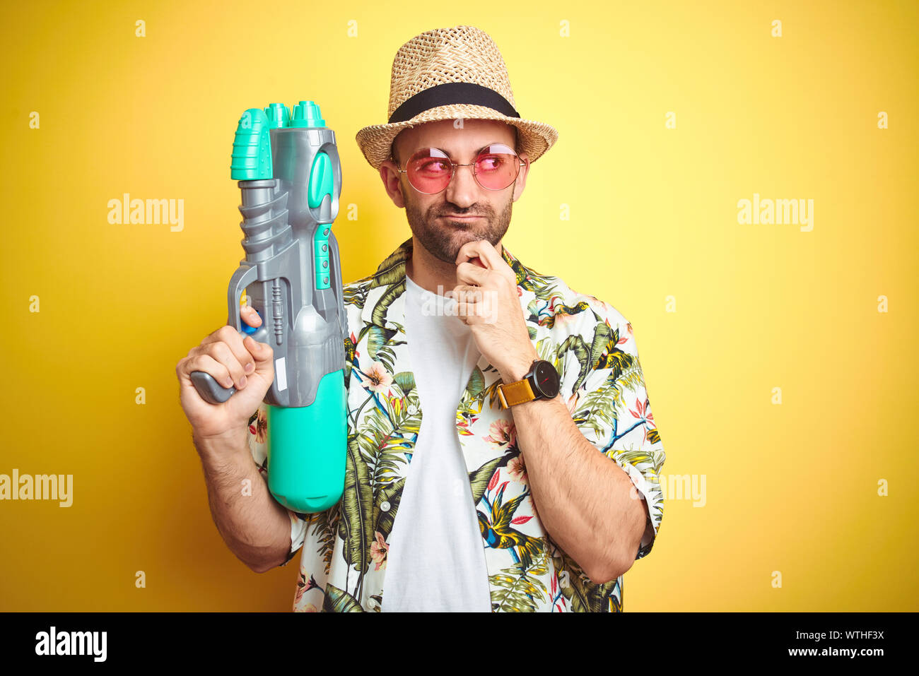 Holding gun to chin hi-res stock photography and images - Alamy