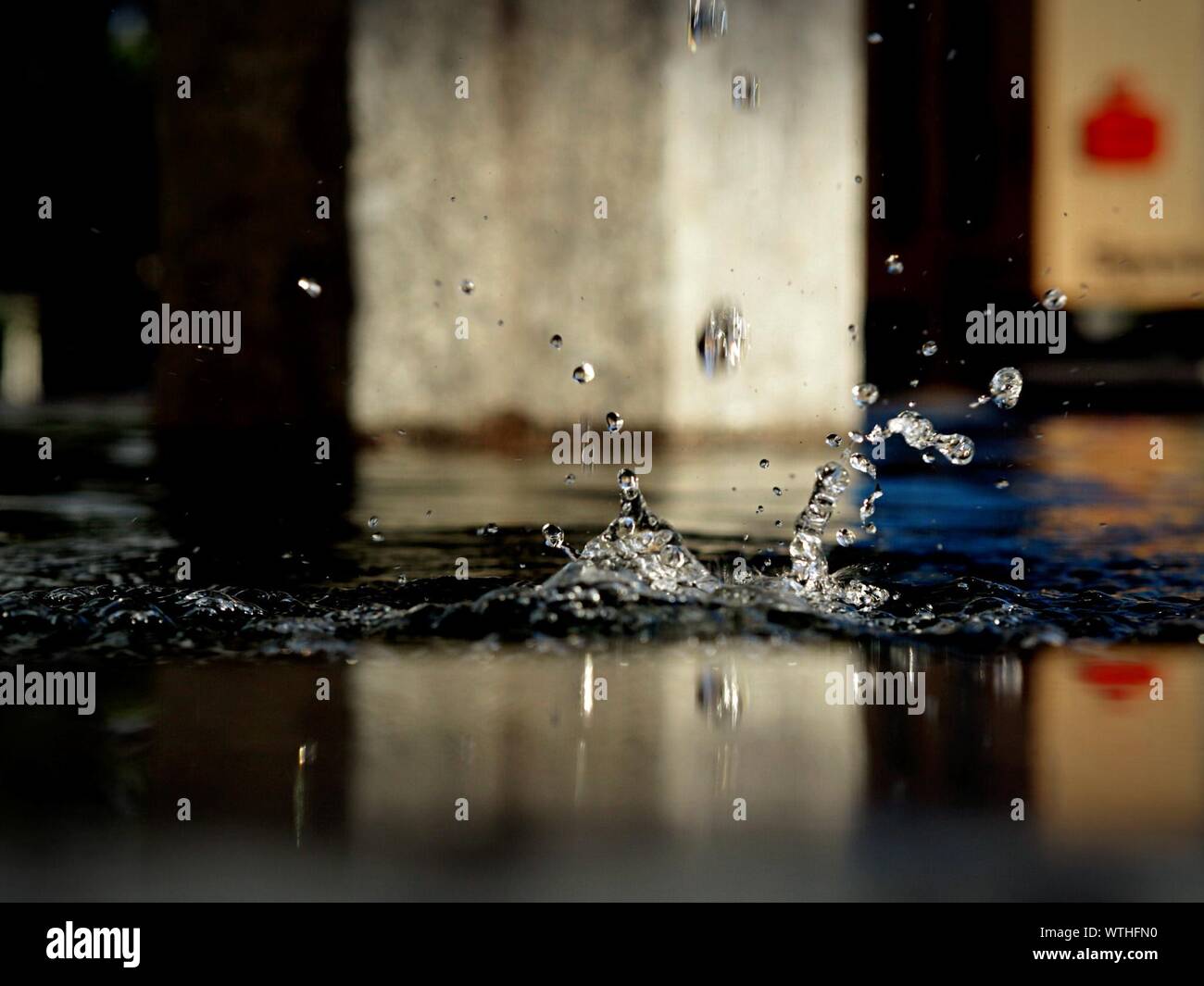 Raindrops in the water hi-res stock photography and images - Alamy