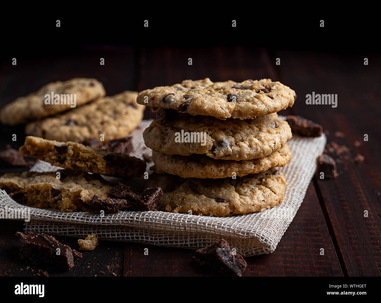 Freshly homemade chocolate chip cookies, over a wooden table Stock ...