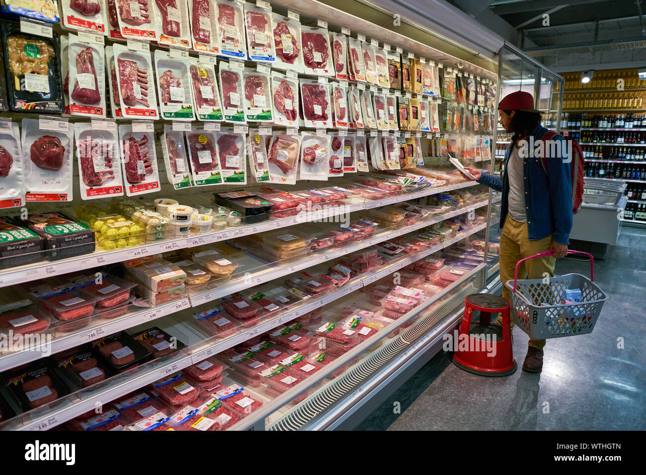 Man grocery shopping in meat hi-res stock photography and images - Alamy