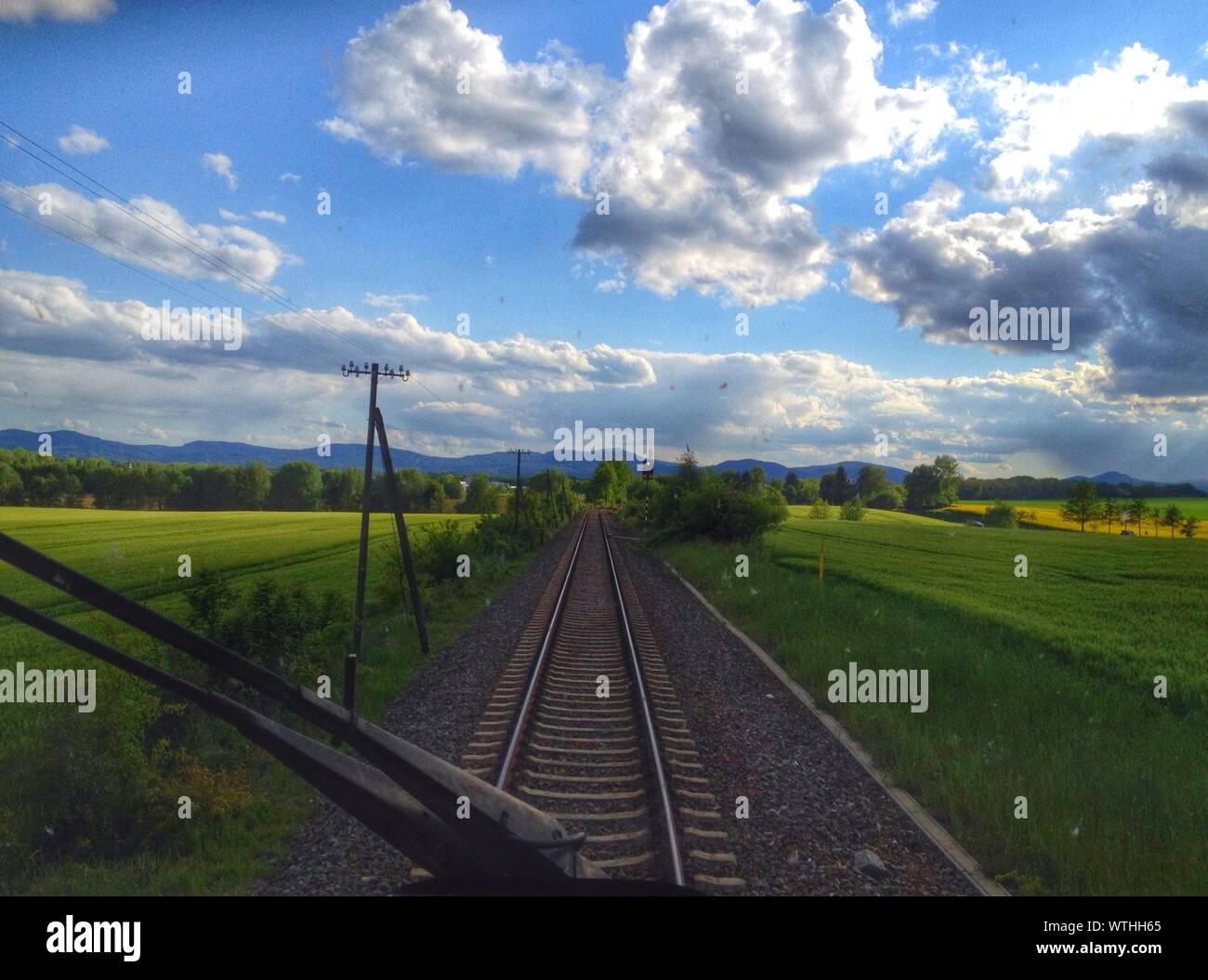 Railroad tracks on grassy hi-res stock photography and images - Alamy