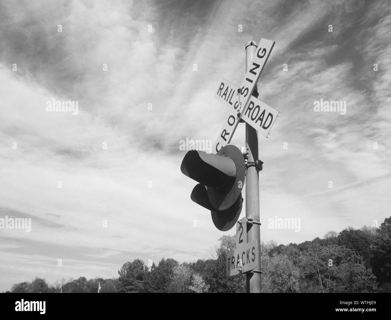 Sky cloud railroad crossing sign hi-res stock photography and images ...
