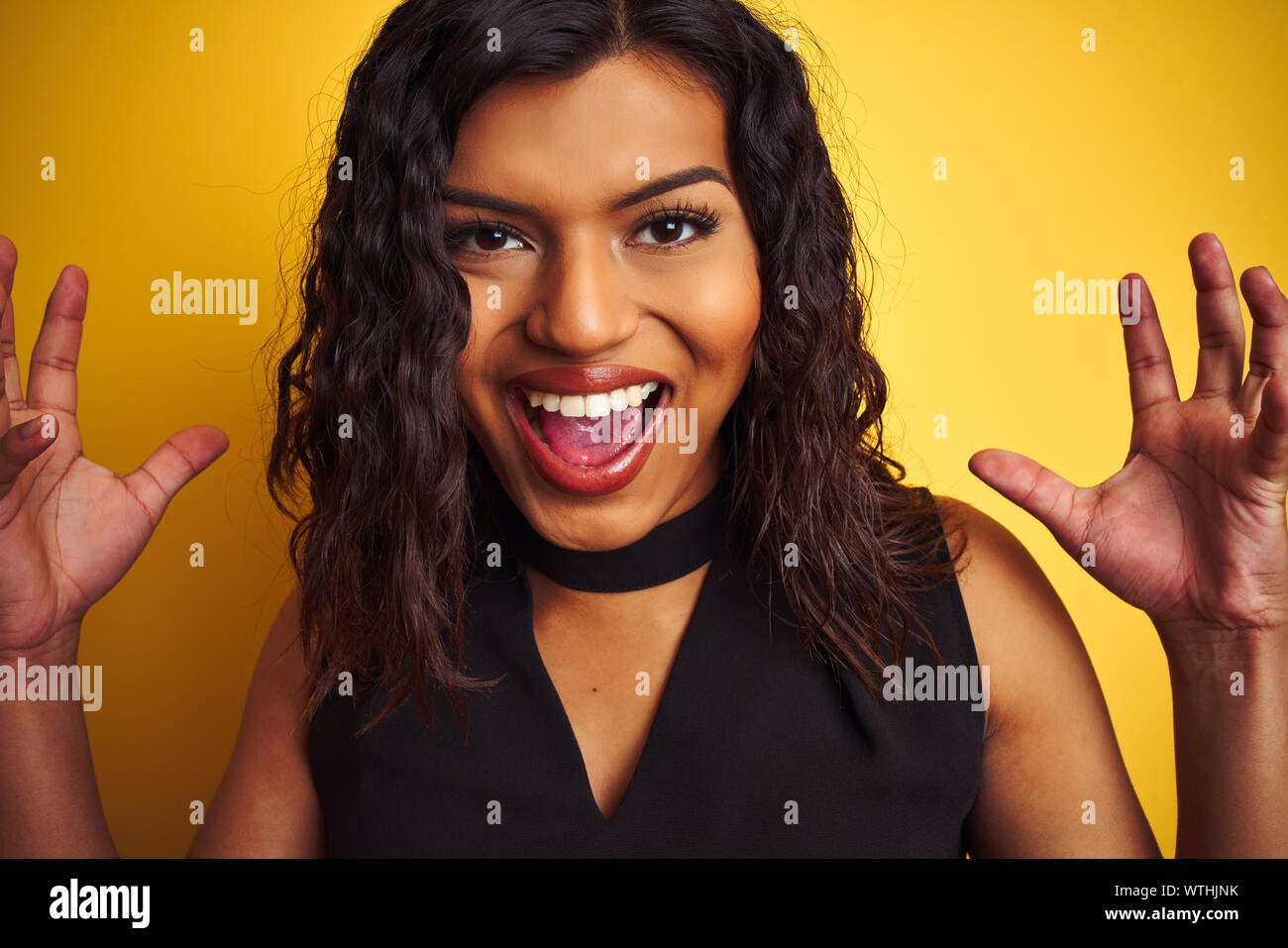 Transsexual transgender woman wearing black t-shirt over isolated ...