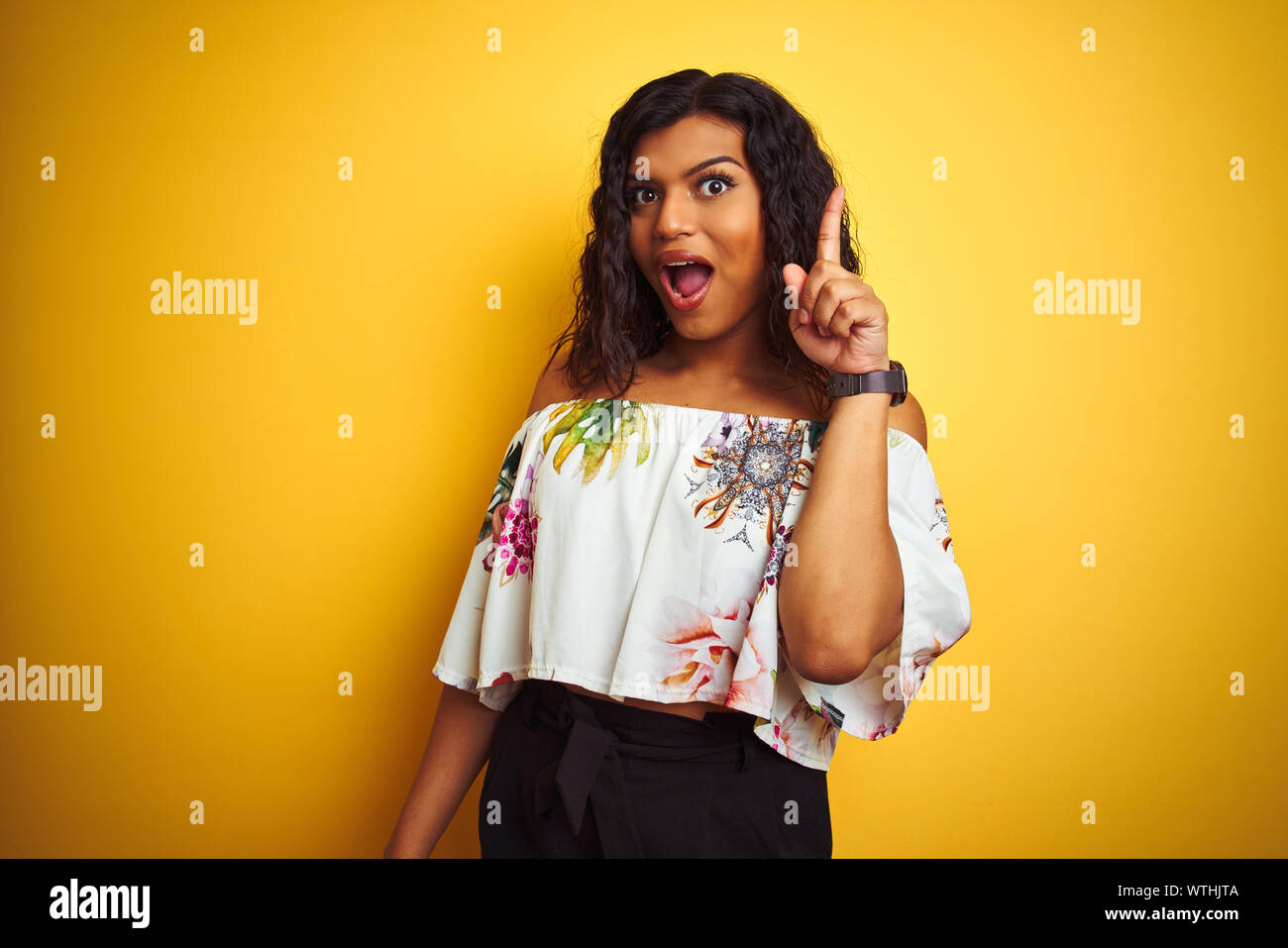 Transsexual transgender woman wearing summer t-shirt over isolated ...
