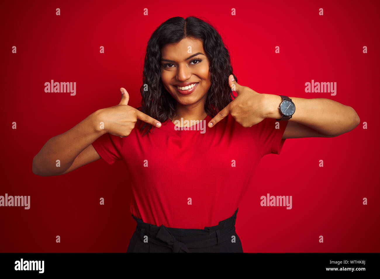 Beautiful transsexual transgender woman wearing t-shirt over isolated ...