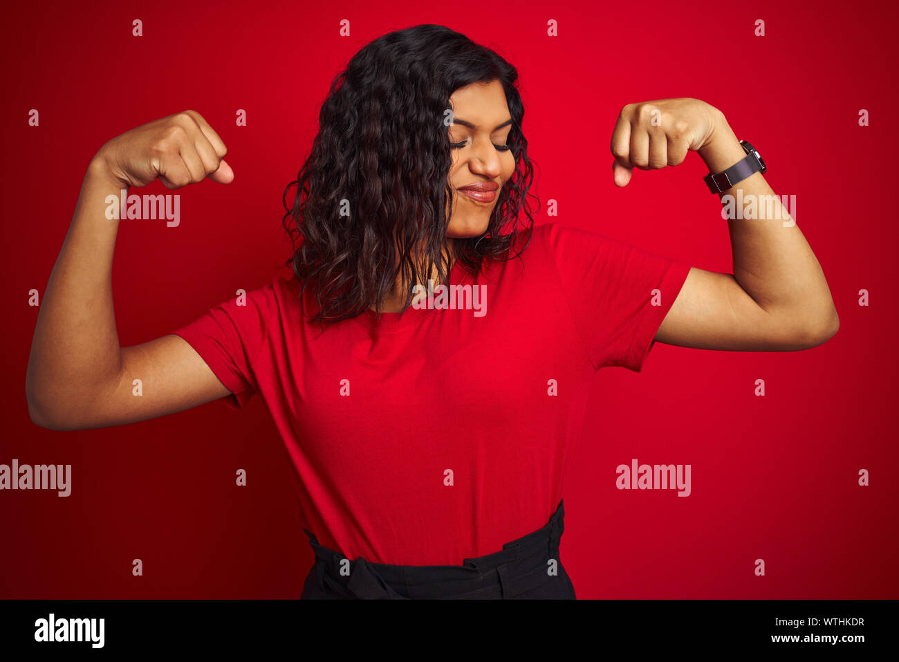 Beautiful transsexual transgender woman wearing t-shirt over isolated ...