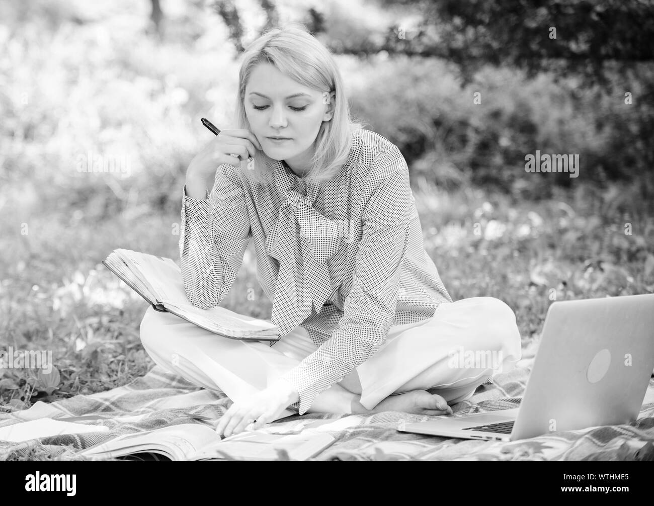 Become successful freelancer. Woman with laptop sit on rug grass meadow ...