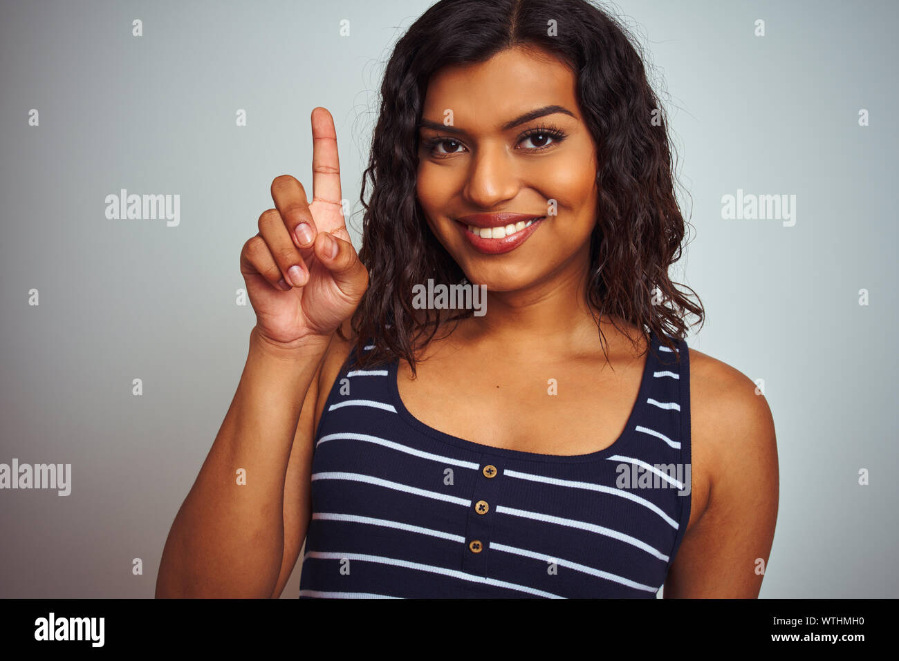 Beautiful transsexual transgender woman wearing striped t-shirt over ...