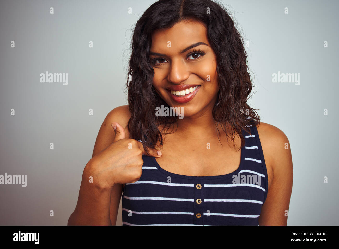 Beautiful transsexual transgender woman wearing striped t-shirt over ...