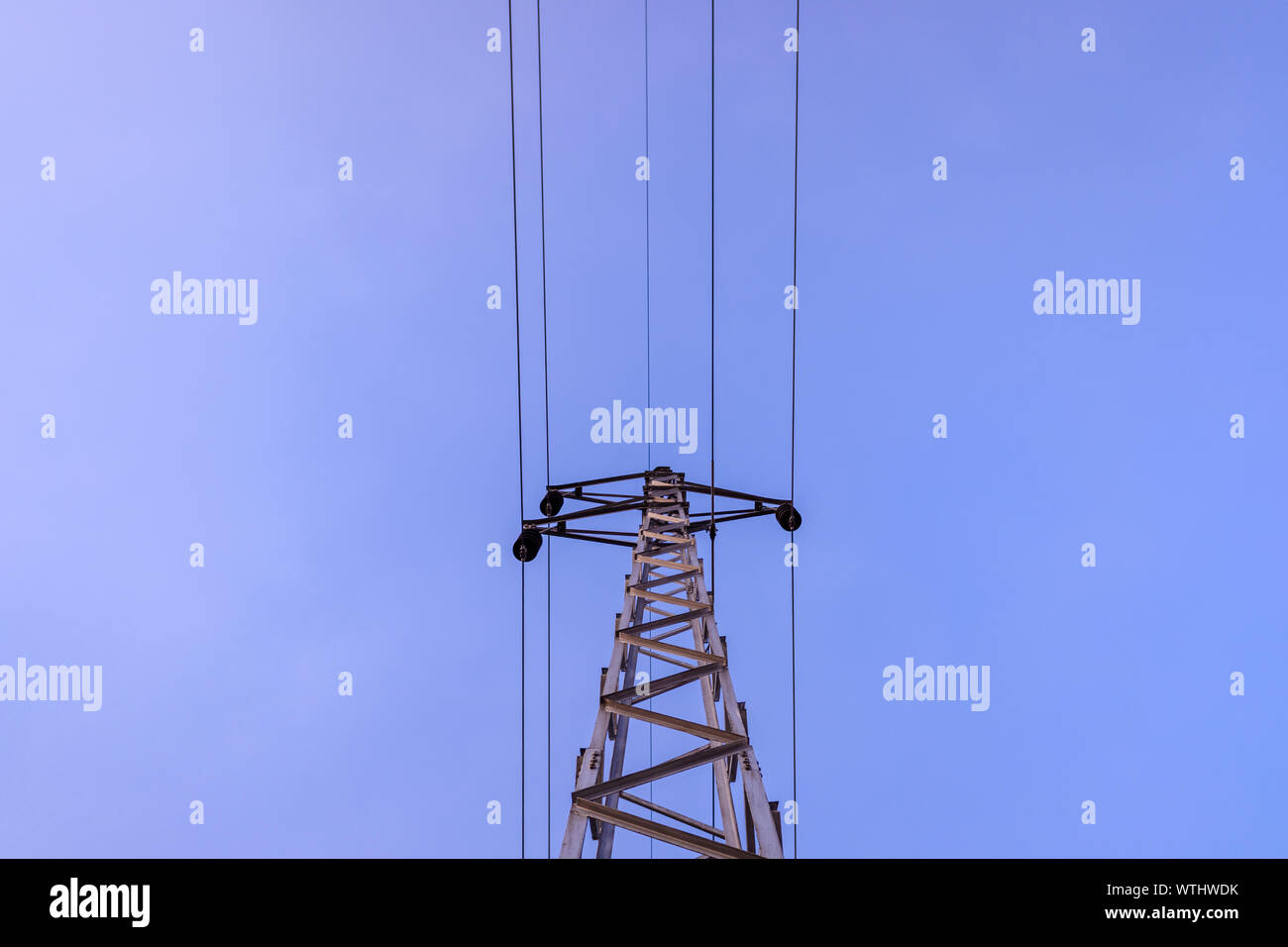 Electric tower holding high voltage cables Stock Photo - Alamy