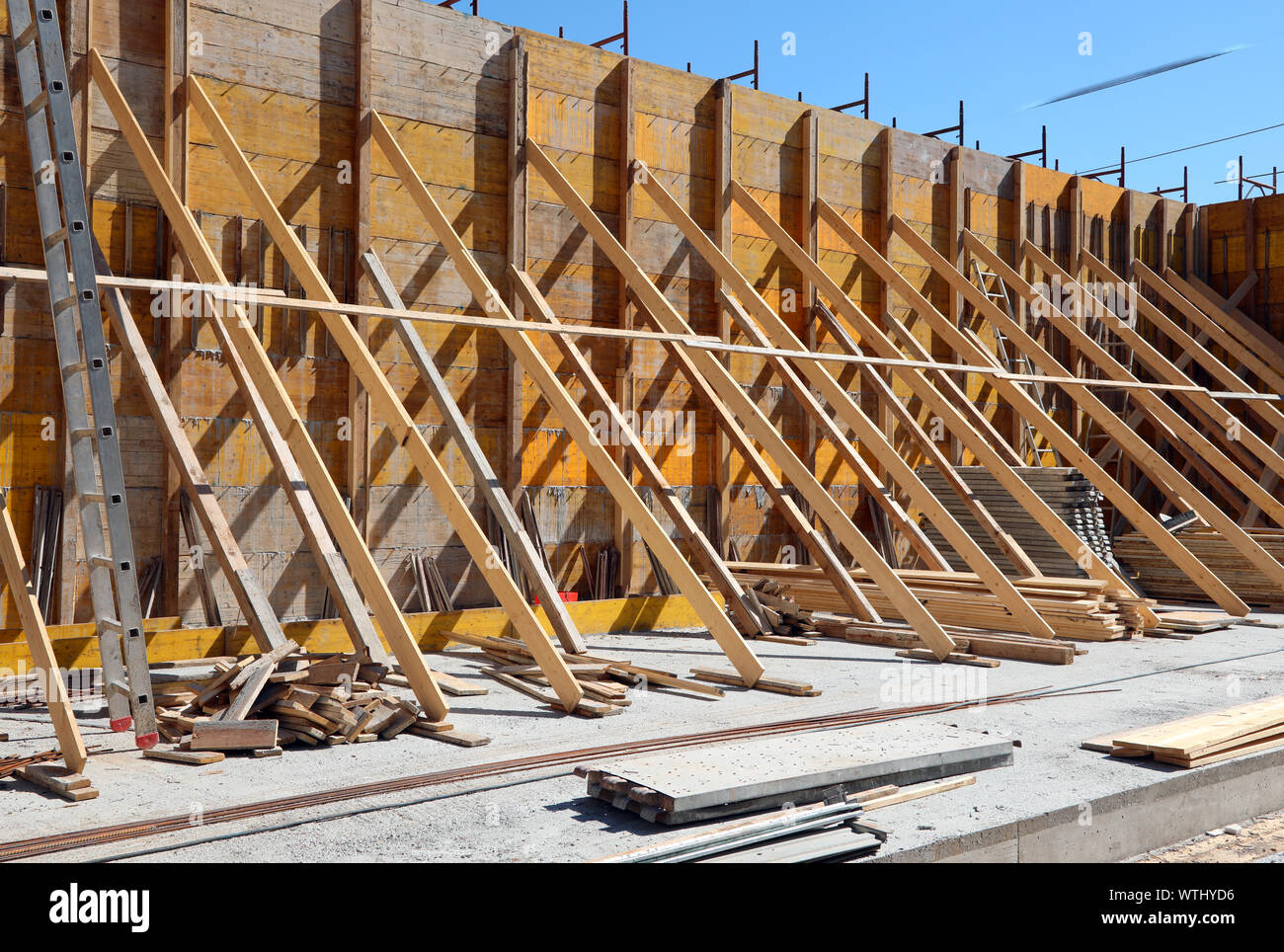 construction site and construction of a large retaining wall of the ...