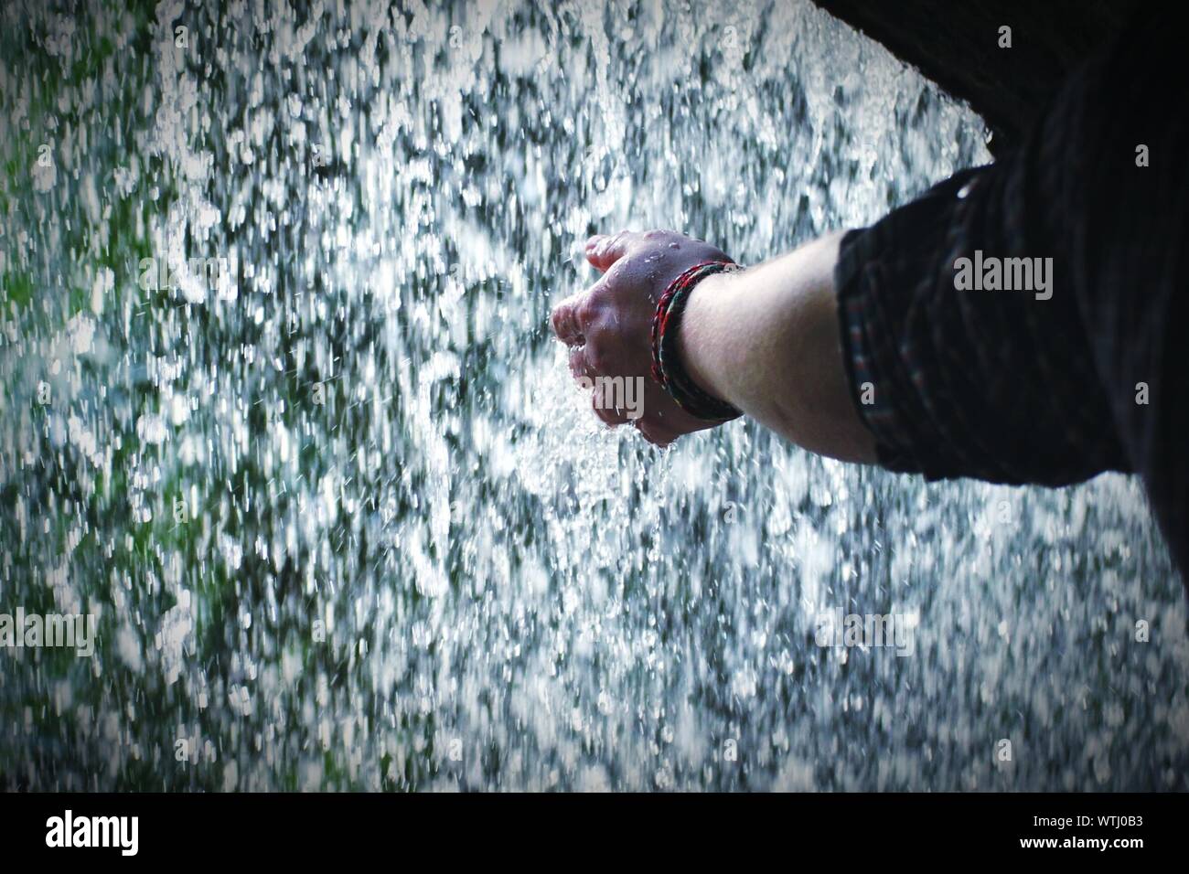 Hand running water hi-res stock photography and images - Alamy
