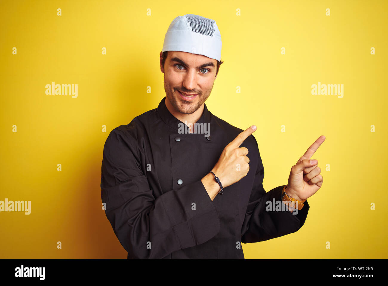 Handsome chef presenting meal hi-res stock photography and images - Alamy
