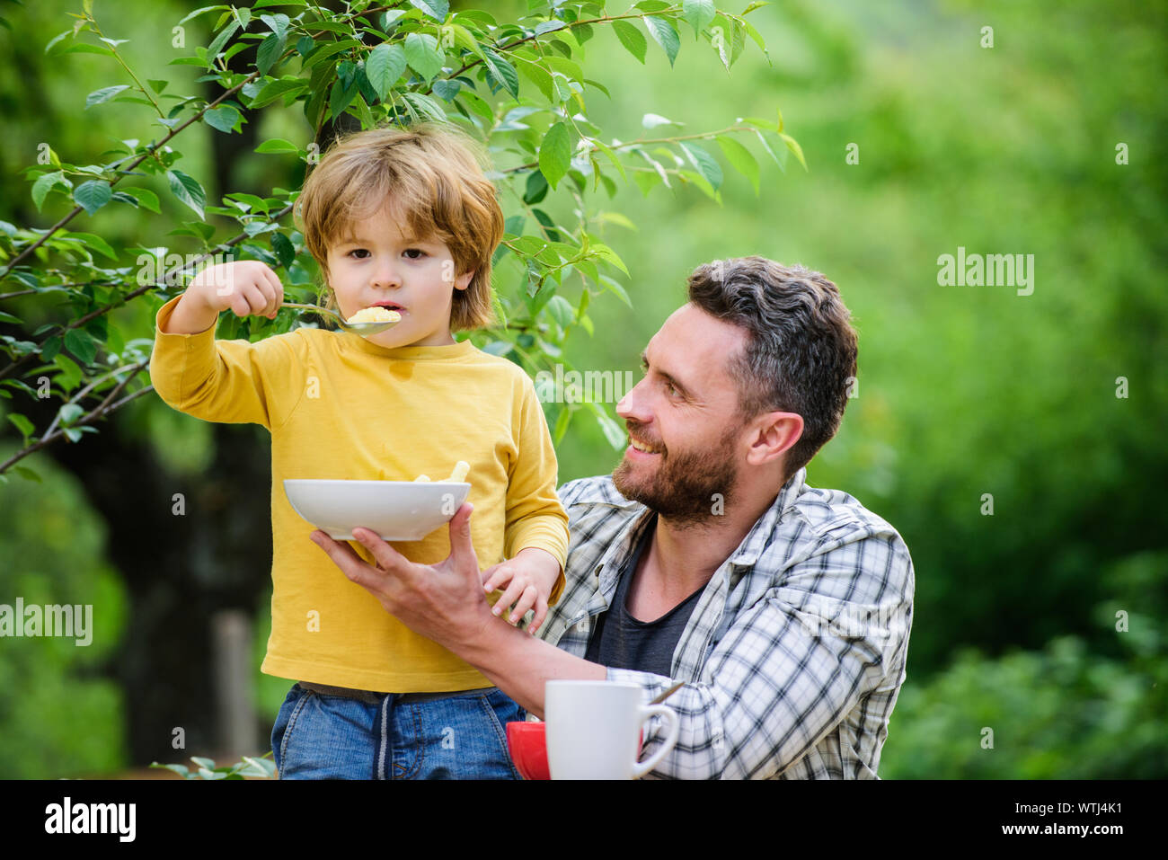 Morning breakfast. Tasty food. happy fathers day. Little boy with dad ...