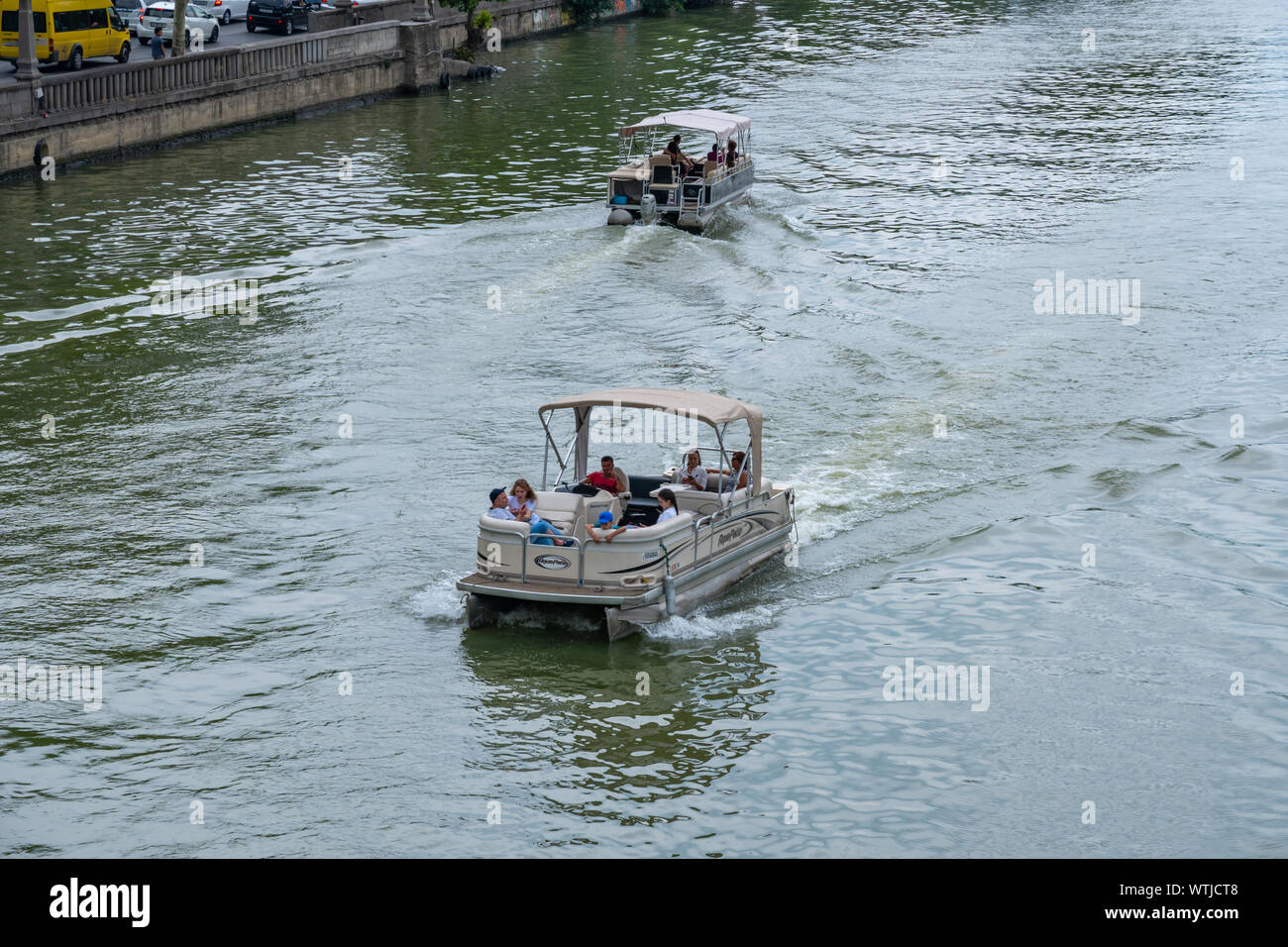 Tbilisi, Georgia - 02.08.2019: Tourists ride on a pleasure boat along ...