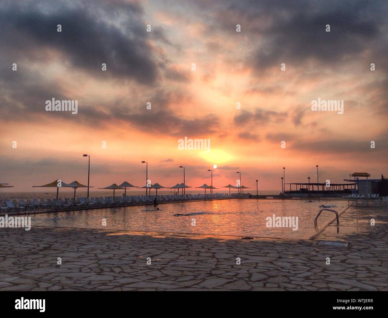Swimming pool sunset hi-res stock photography and images - Alamy
