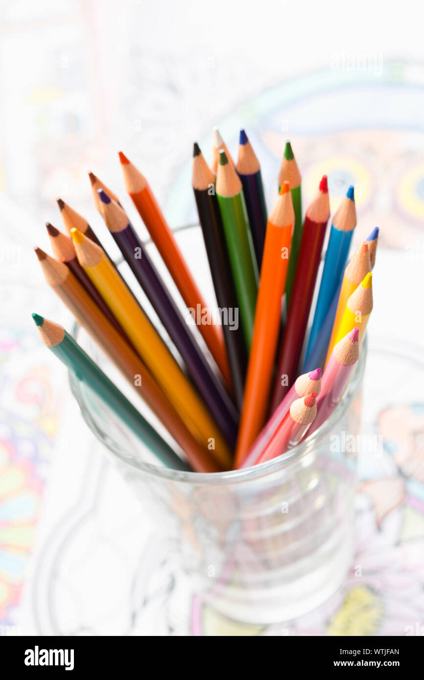 Colored pencils in glass Stock Photo - Alamy