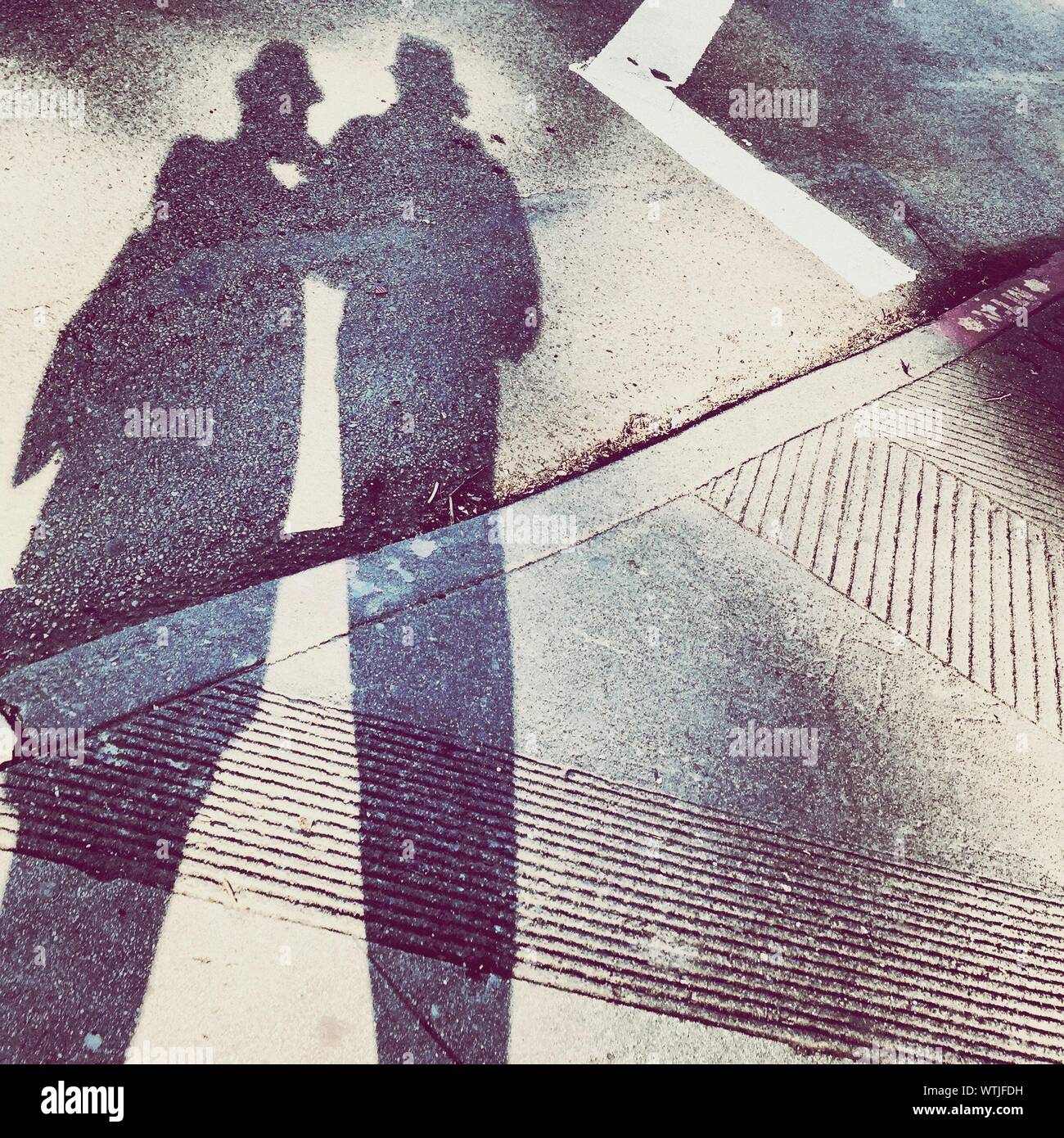 People casting shadow hi-res stock photography and images - Alamy