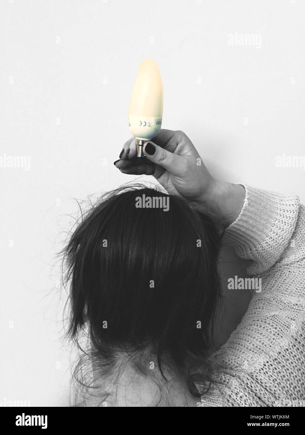 Holding Head Light Bulb High Resolution Stock Photography and Images ...