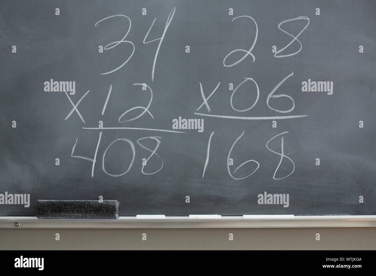 Number written with chalk on blackboard Stock Photo - Alamy