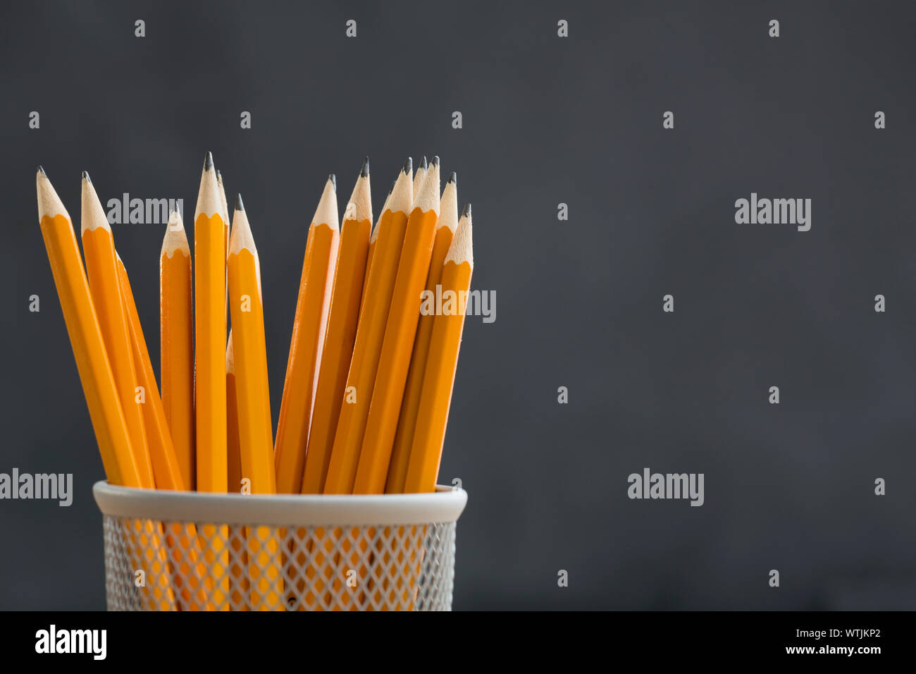 Pencil in cup hi-res stock photography and images - Alamy
