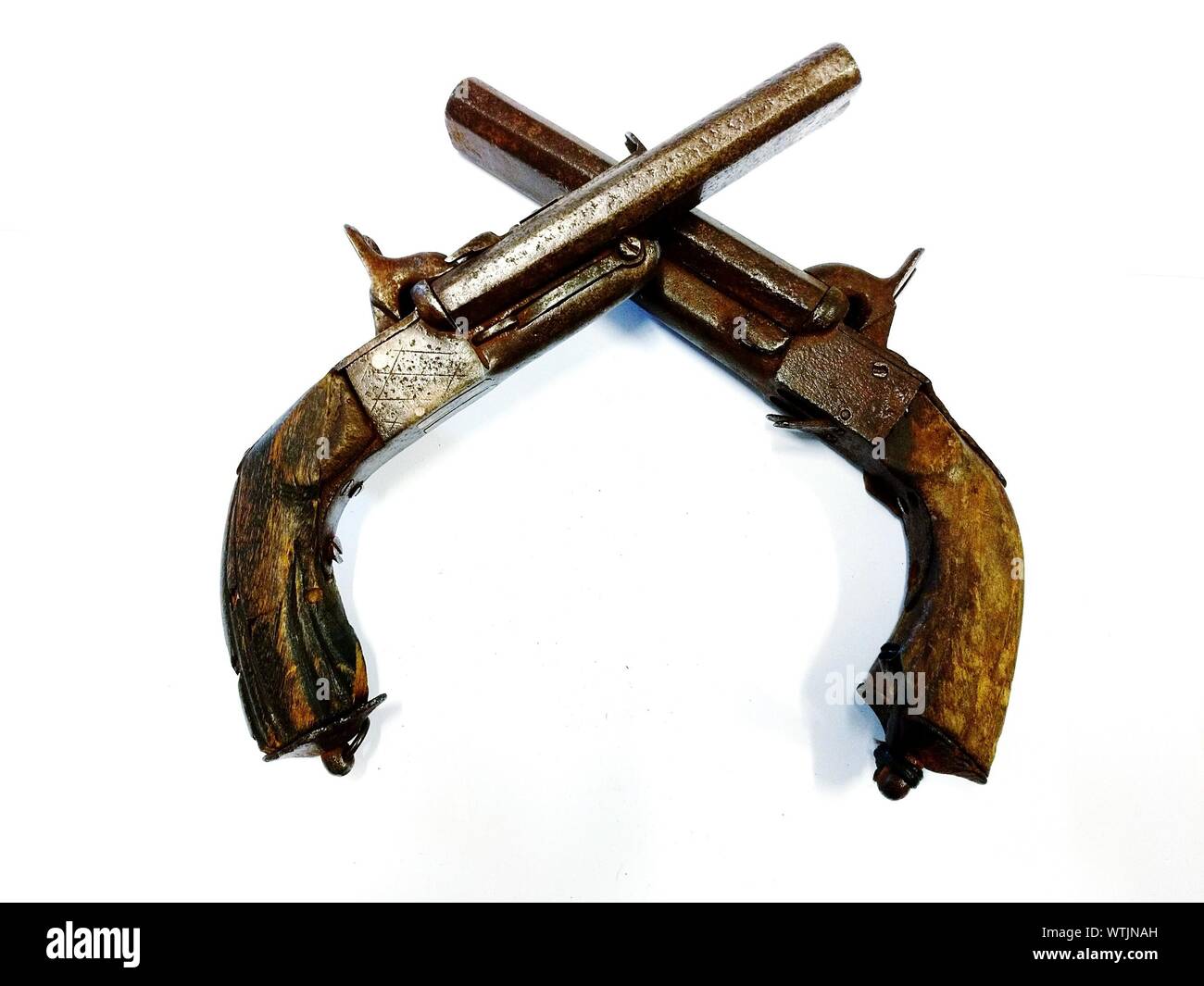 Background old fashioned pistols hi-res stock photography and images ...