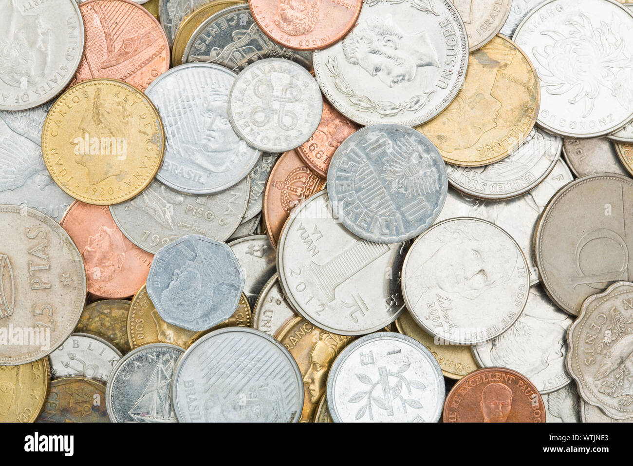 Coins of various currencies Stock Photo - Alamy