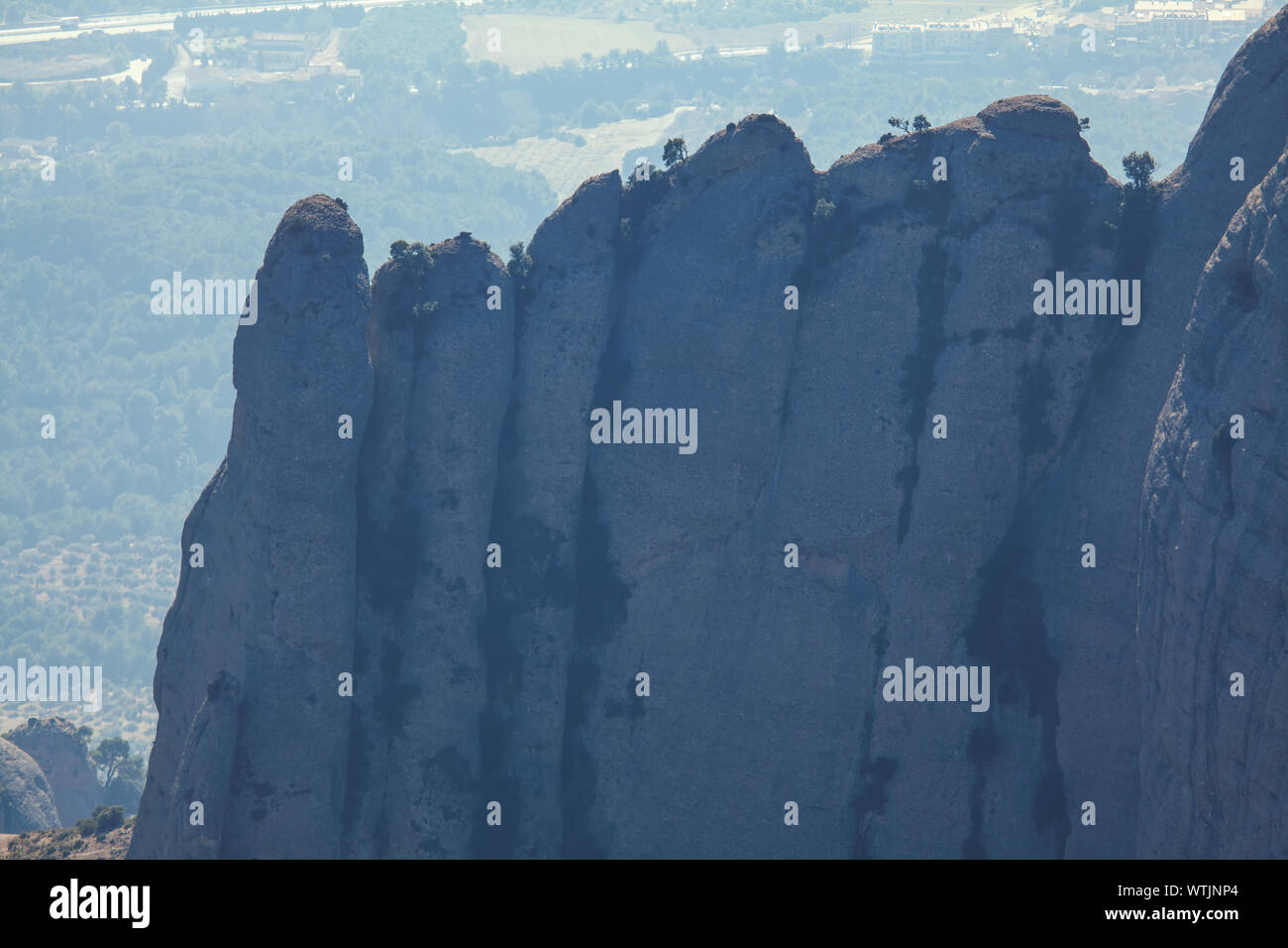 beautiful scenery with tall cliffs of Montserrat Stock Photo - Alamy
