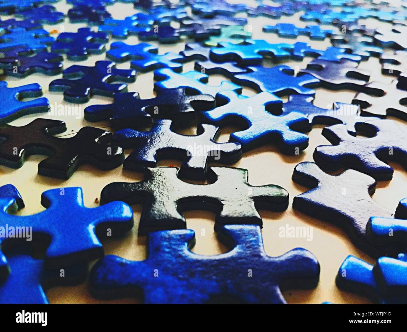 Large jigsaw puzzle piece hi-res stock photography and images - Alamy