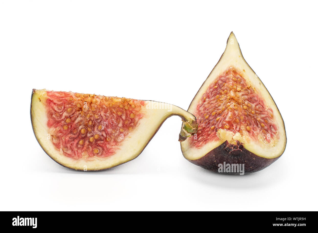 Group of two slices of fresh fig fruit isolated on white background ...