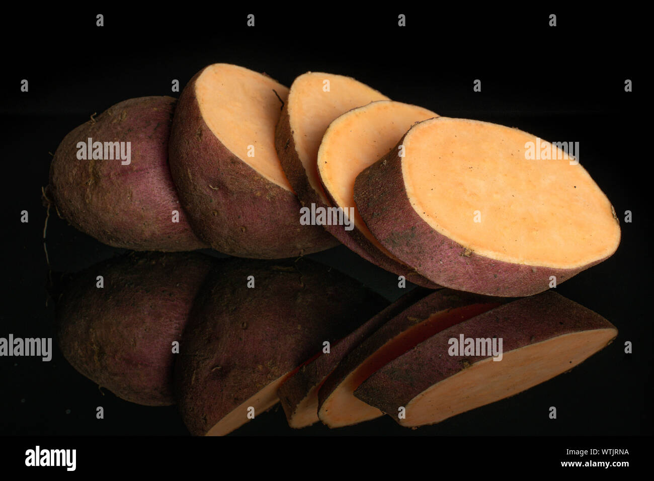 Group of one half three slices of fresh brown sweet potato isolated on ...