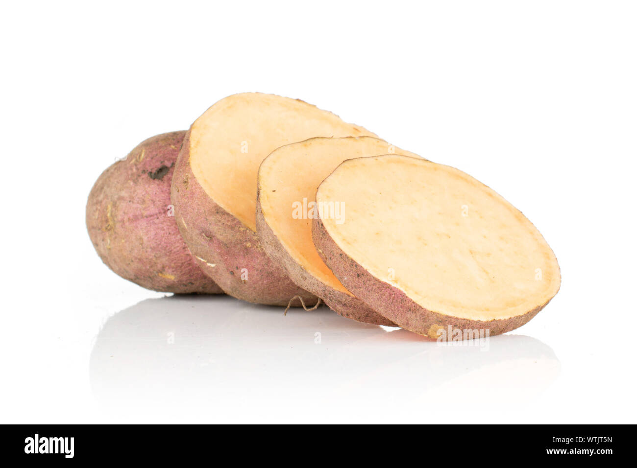 Group of one half two slices of fresh brown sweet potato isolated on ...