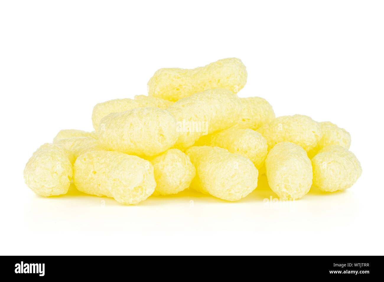 Lot of whole salted yellow corn puff isolated on white background Stock ...