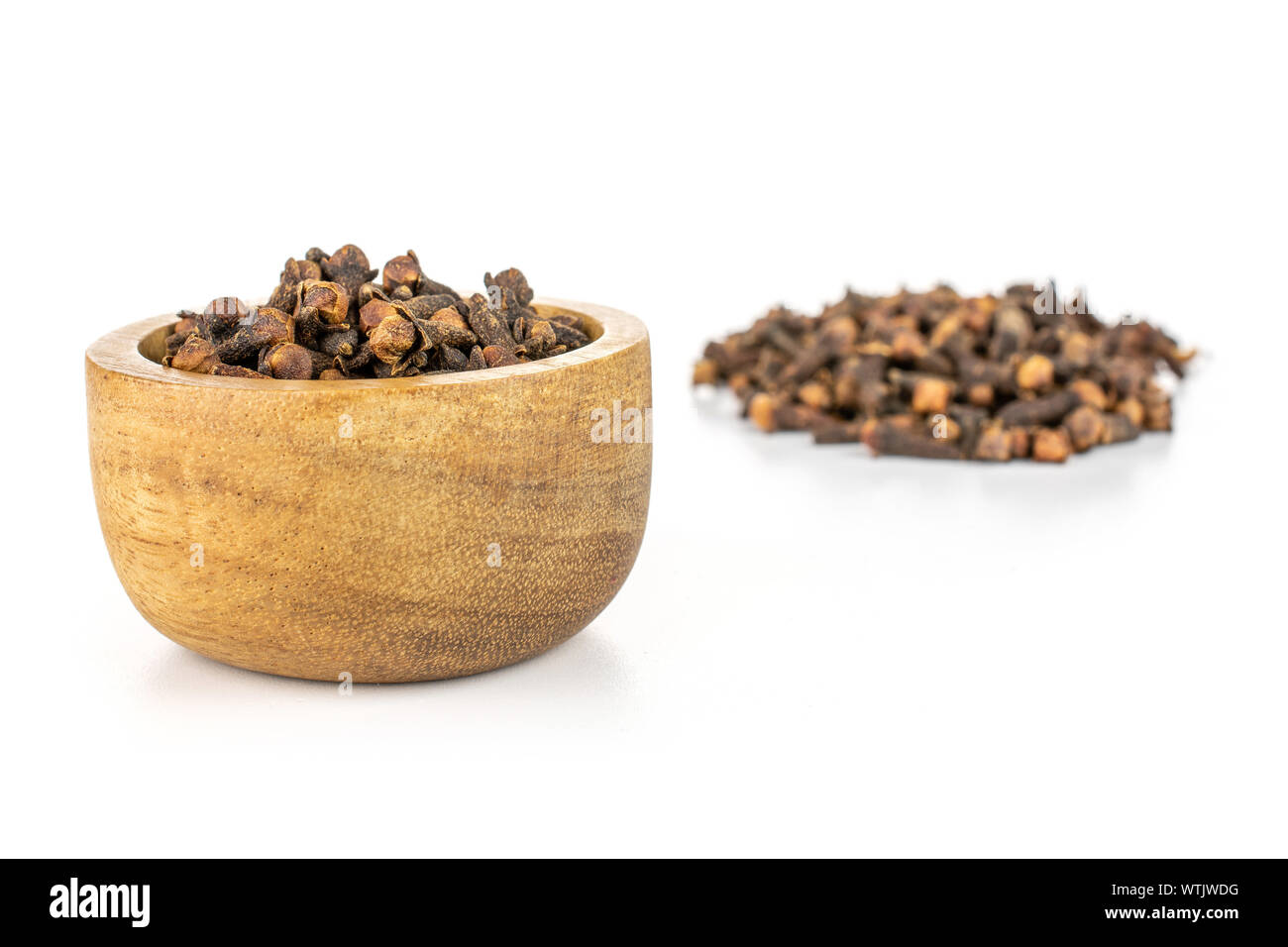 Lot of whole dry brown clove small group is aside and the rest is in ...