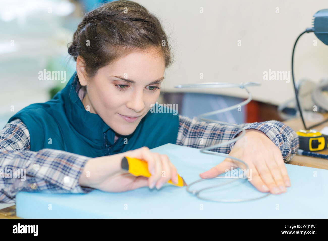 a female technician with tools Stock Photo - Alamy